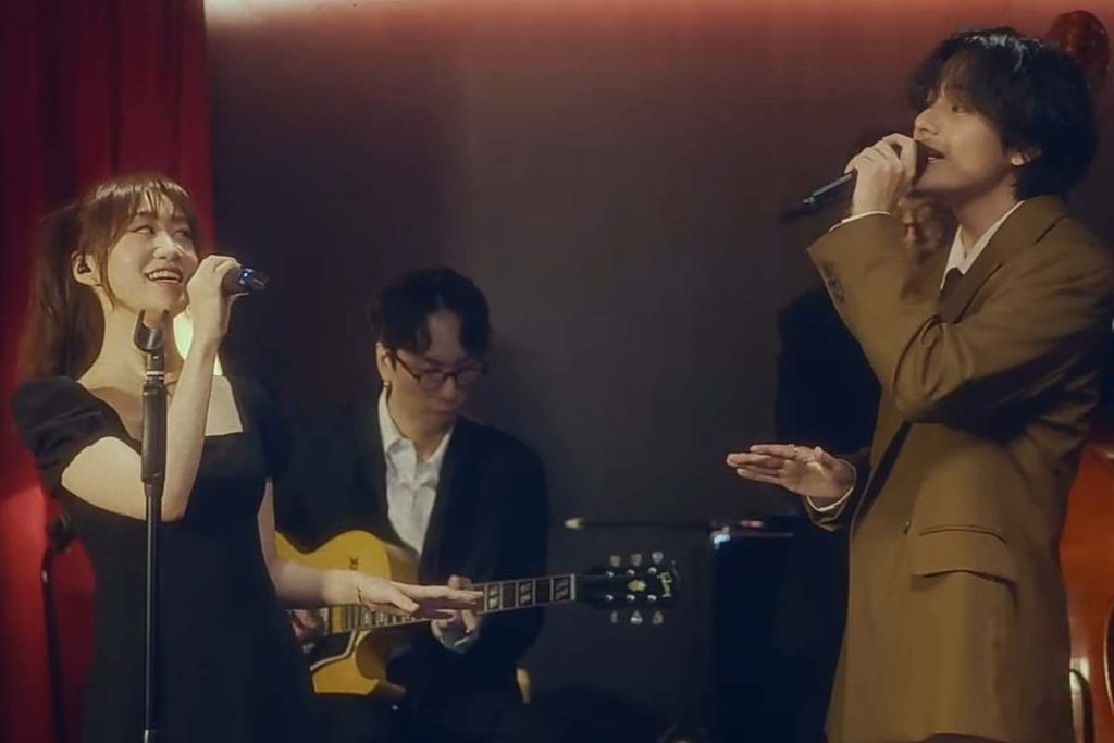 BTS' Taehyung appears singing along with a beautiful woman