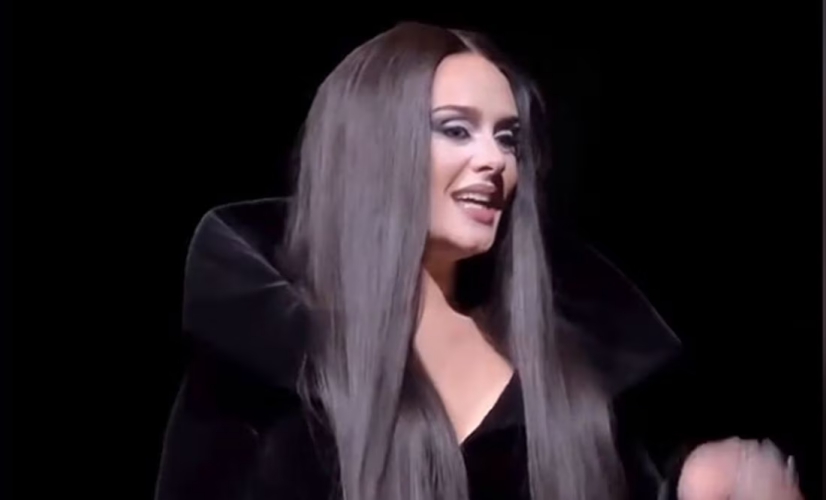 Adele slays with a Morticia Addams Halloween costume